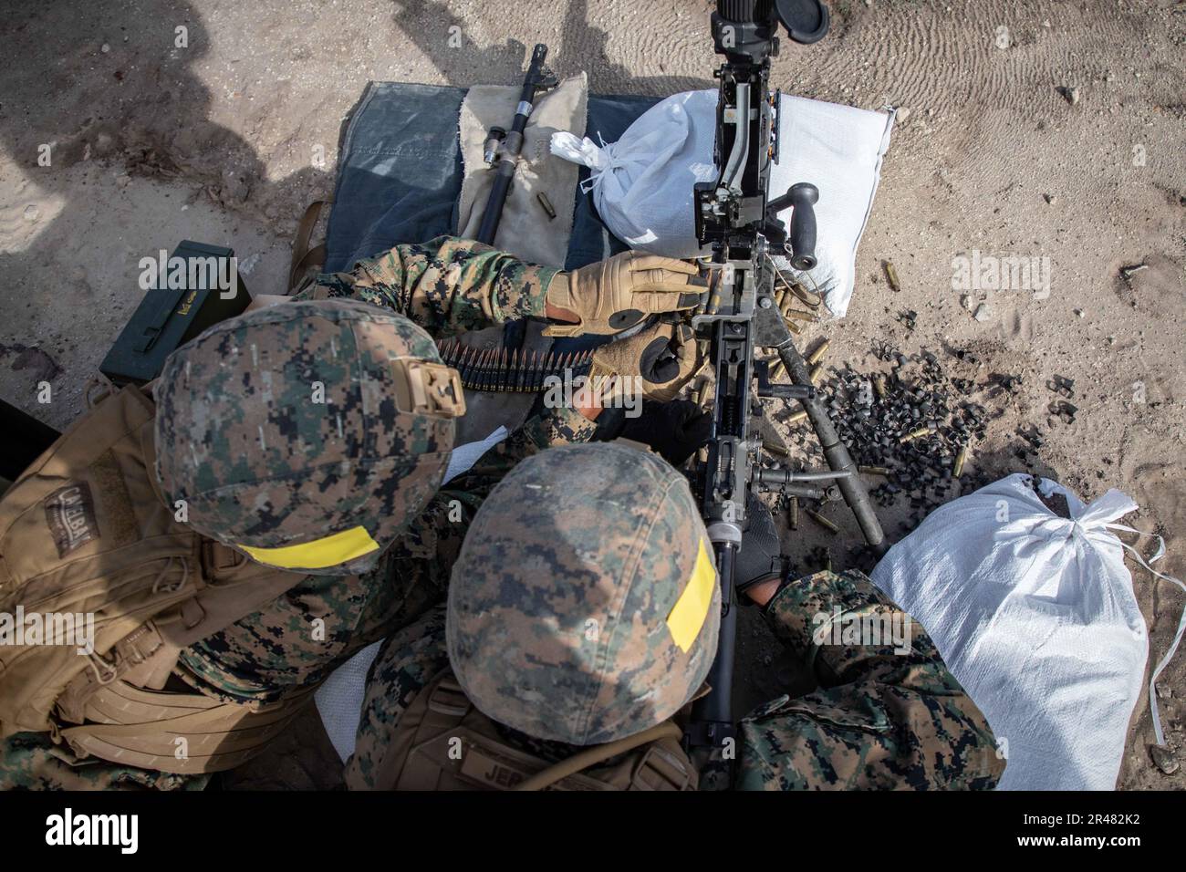 U.S. Marines with 2nd Marine Logistics Group (MLG), load 7.62mm ...