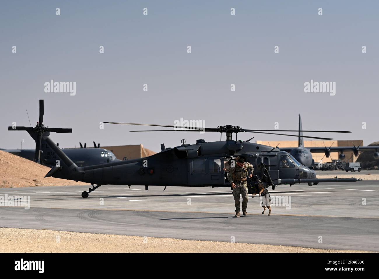 U.S. Air Force Staff Sgt. Jordan Utter and military working dog “Gary ...