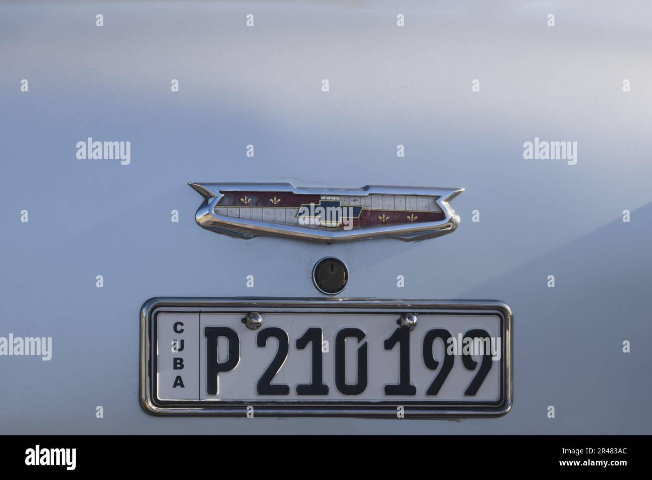 A closeup of the back end of a vintage Chevrolet automobile, with ...