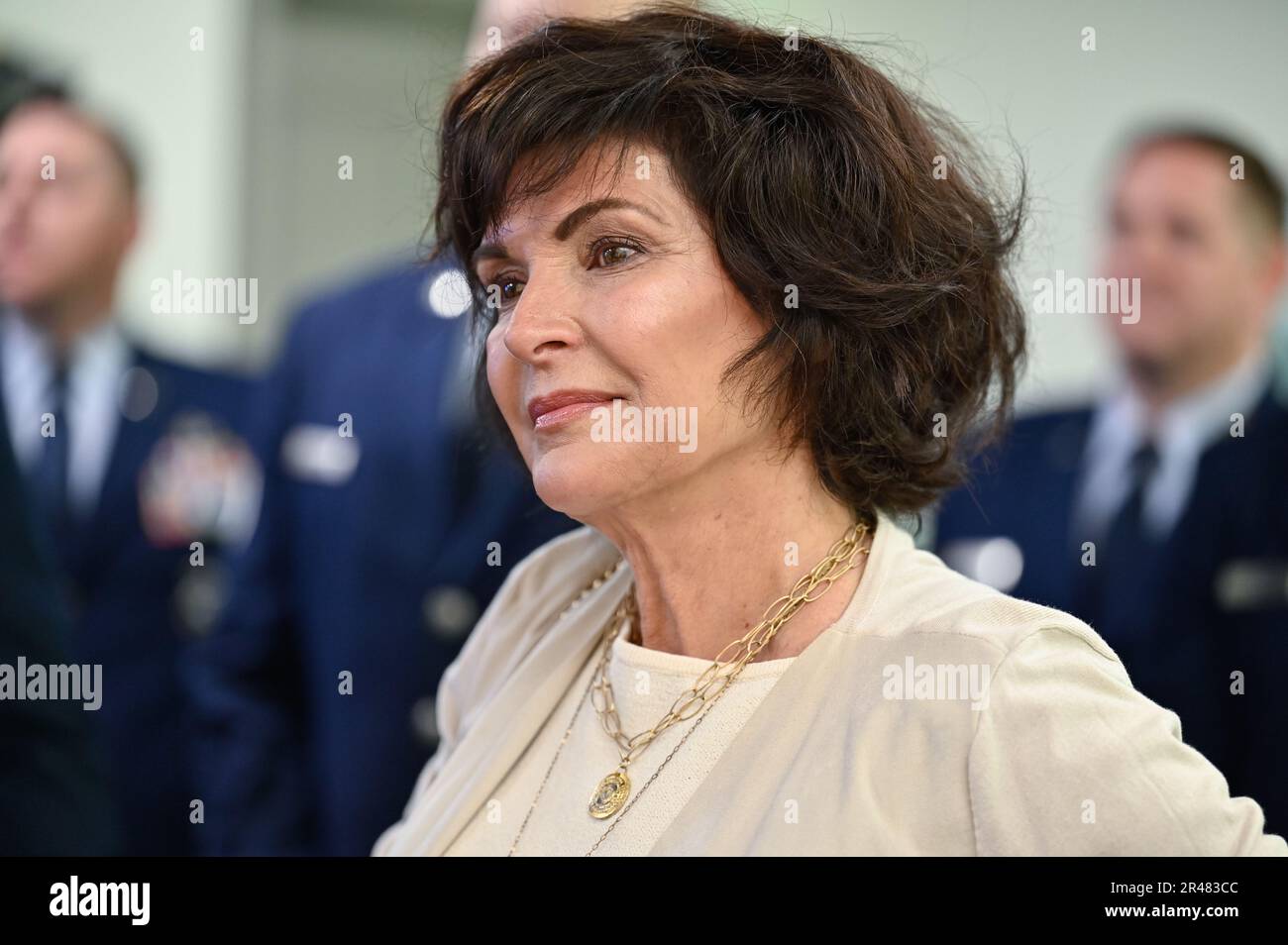 Janine Sijan listens to comments from Air Force Chief of Staff Gen. CQ ...