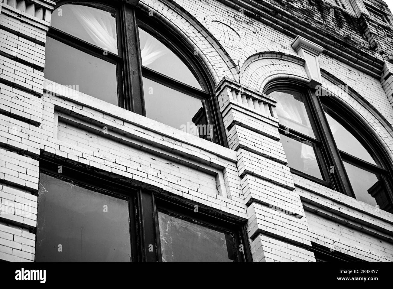 Brick building facade in Black and White Stock Photos & Images - Alamy