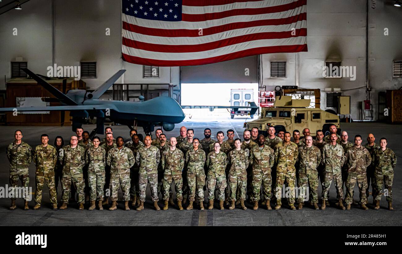 U.S. service members pose for a group photo at Al Dhafra Air Base ...