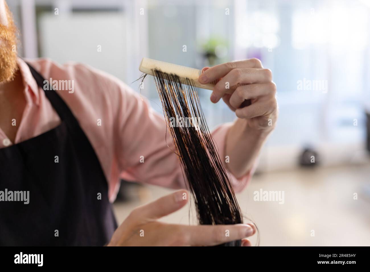 Professional male hairdresser comb hi-res stock photography and images ...