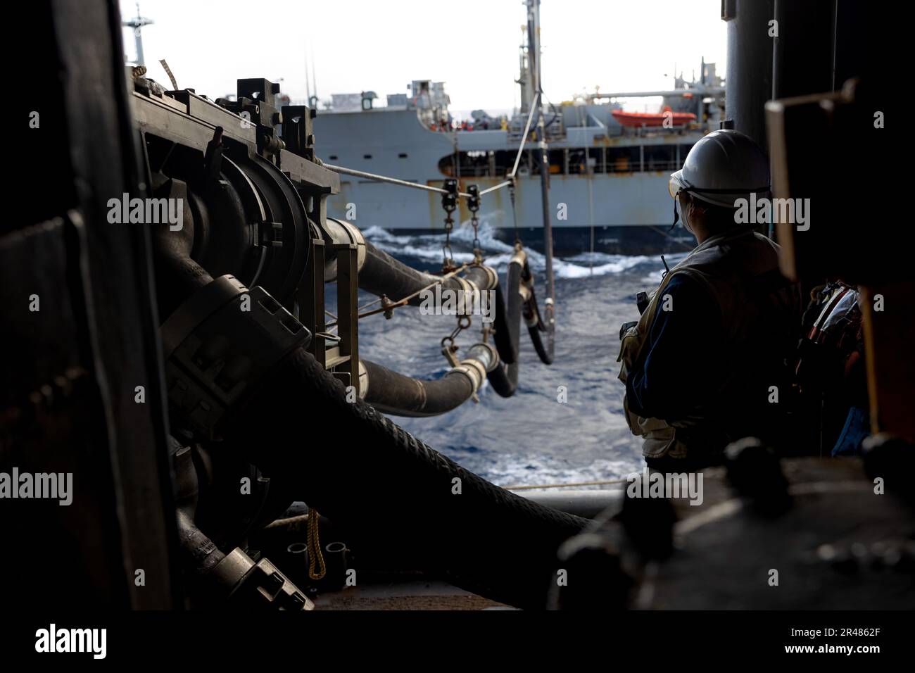 A U.S. Navy Sailor assigned to the amphibious assault ship USS America ...