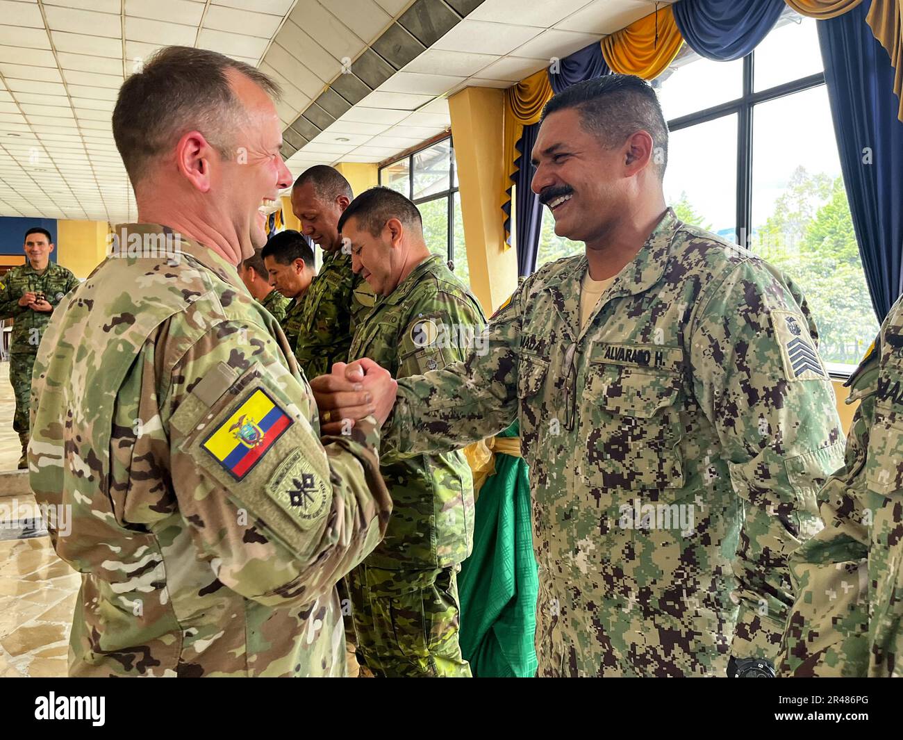Command Sgt. Maj. Jesse Withers shakes hands with Sgt. Maj. Holen ...