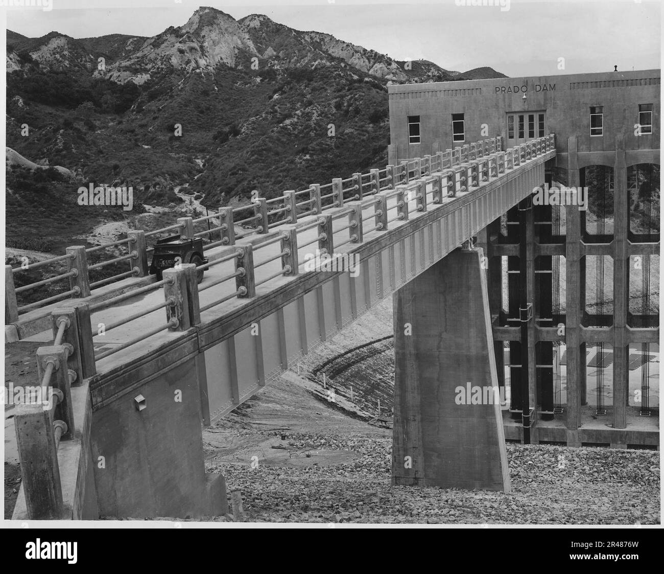 Upstream view from the top of the dam showing the service bridge and ...
