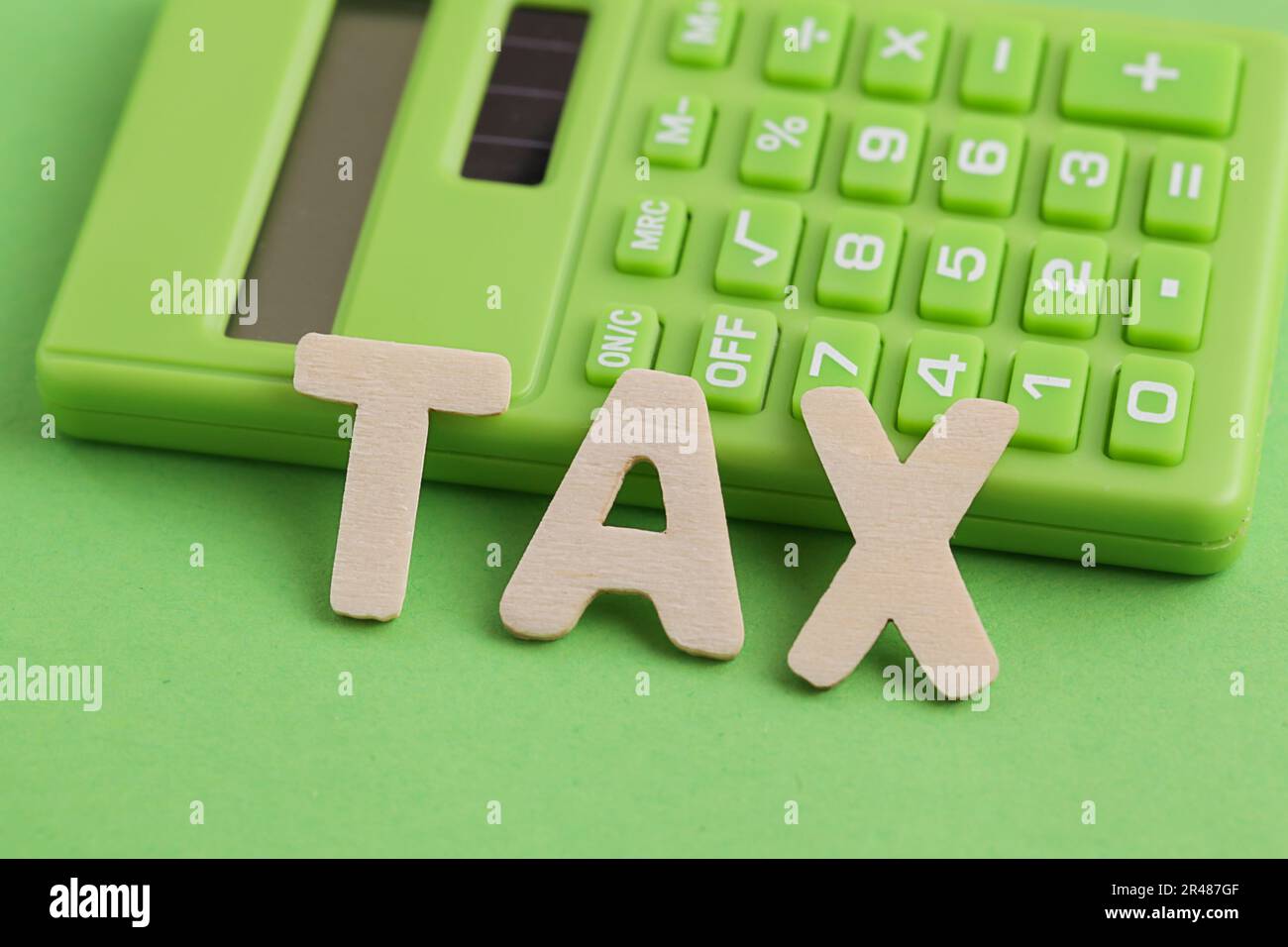 Decarbonisation. Carbon tax. Green Calculator, word TAX written in ...