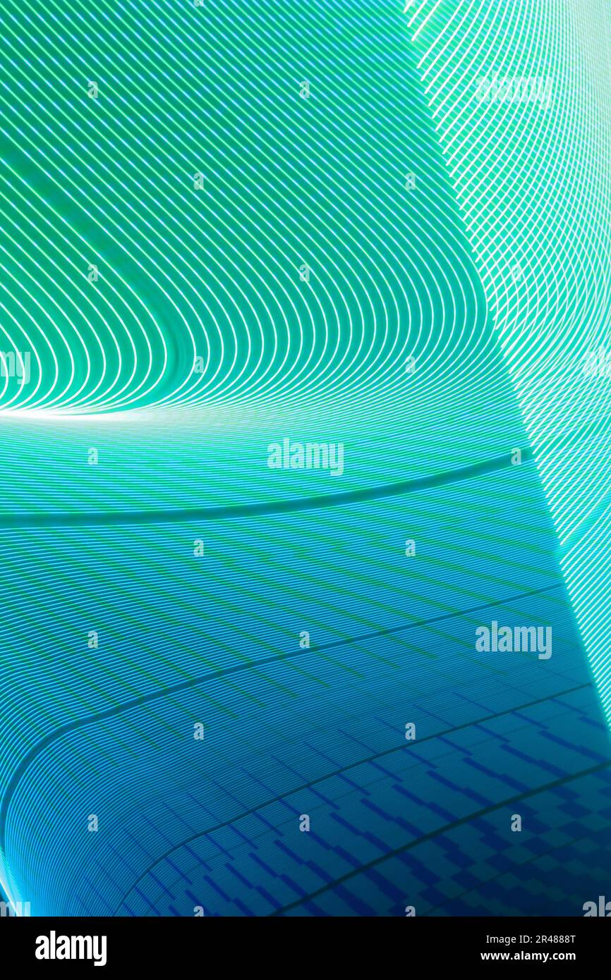 A large display featuring a pattern of turquoise lights radiating ...