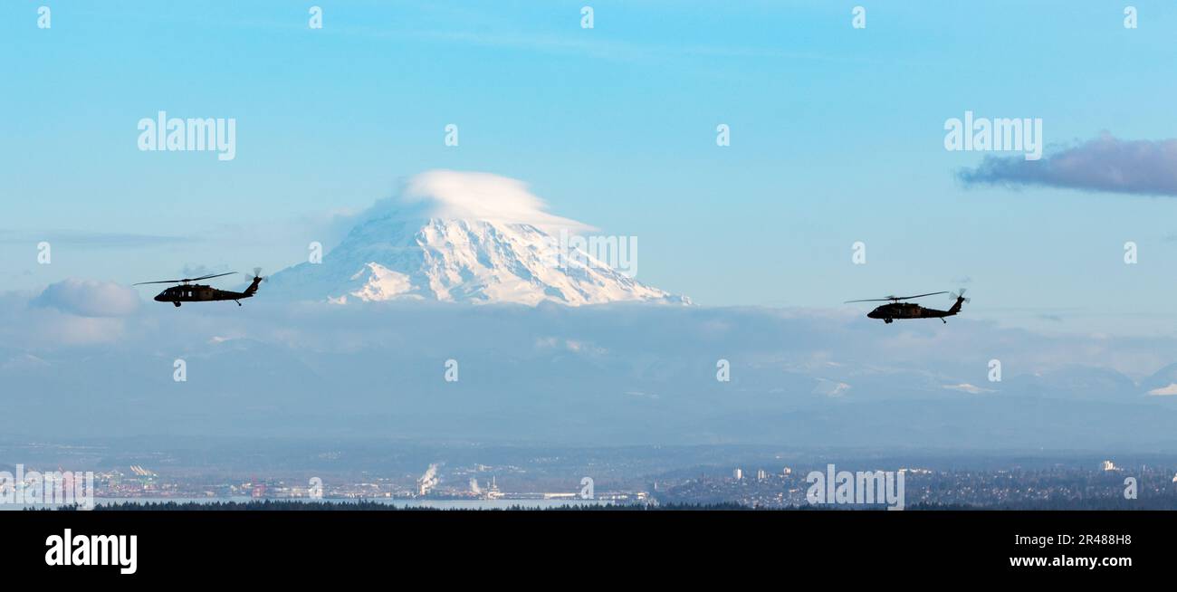 Two UH-60M Black Hawk helicopters assigned to Charlie Company, 2-158 ...