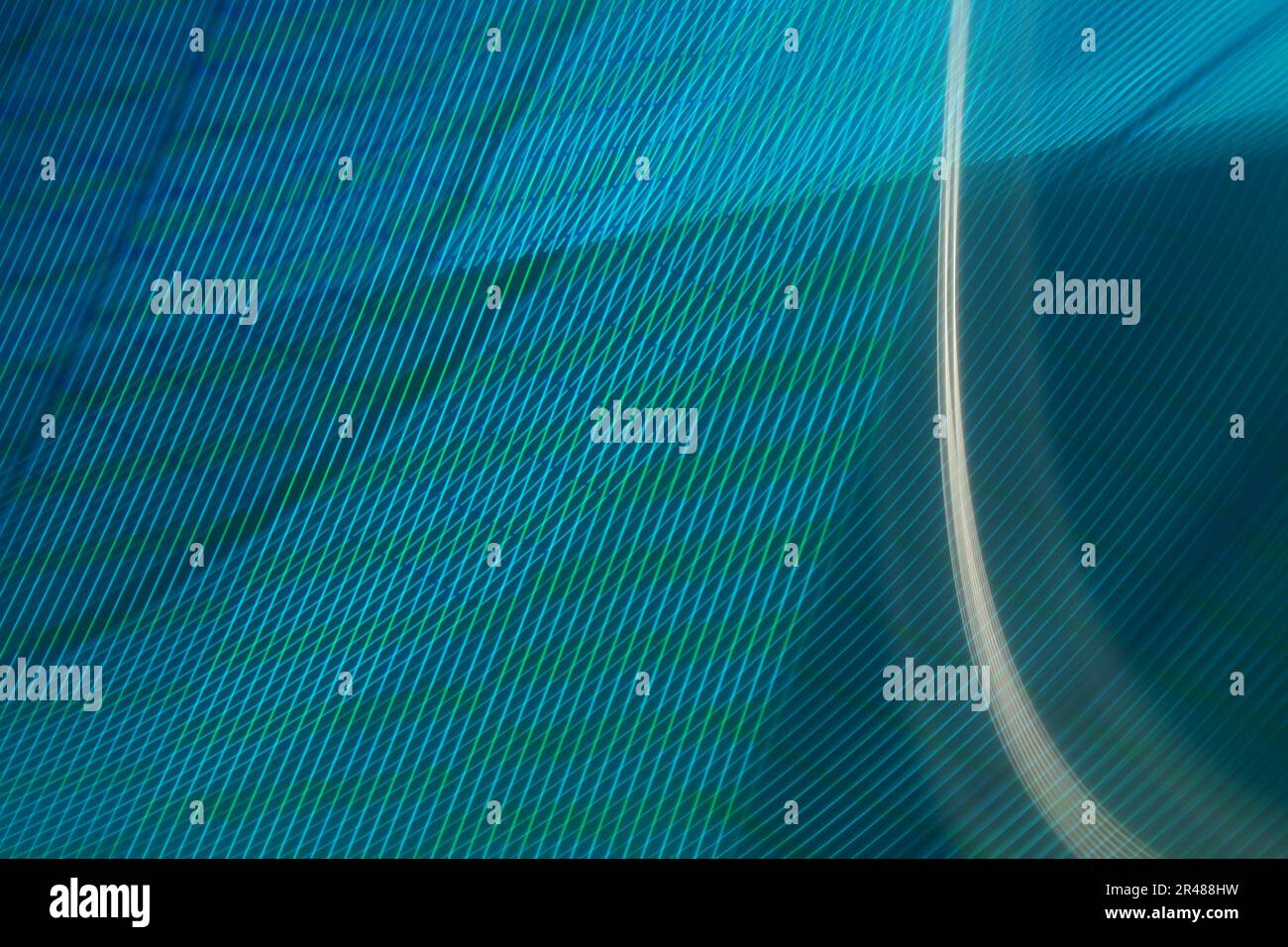 A large display featuring a pattern of blue lights radiating outward ...