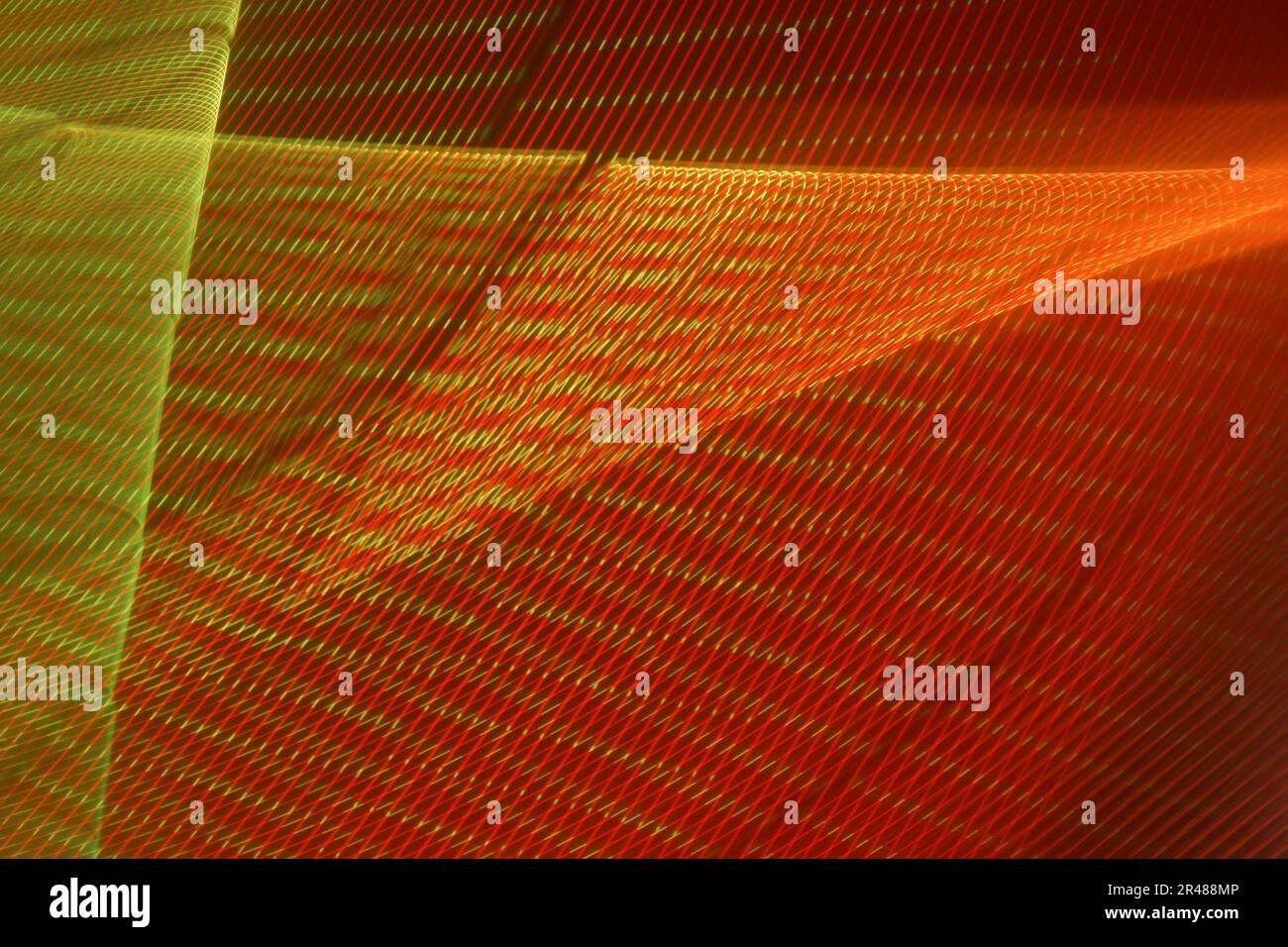 A large display featuring a pattern of red lights radiating outward ...