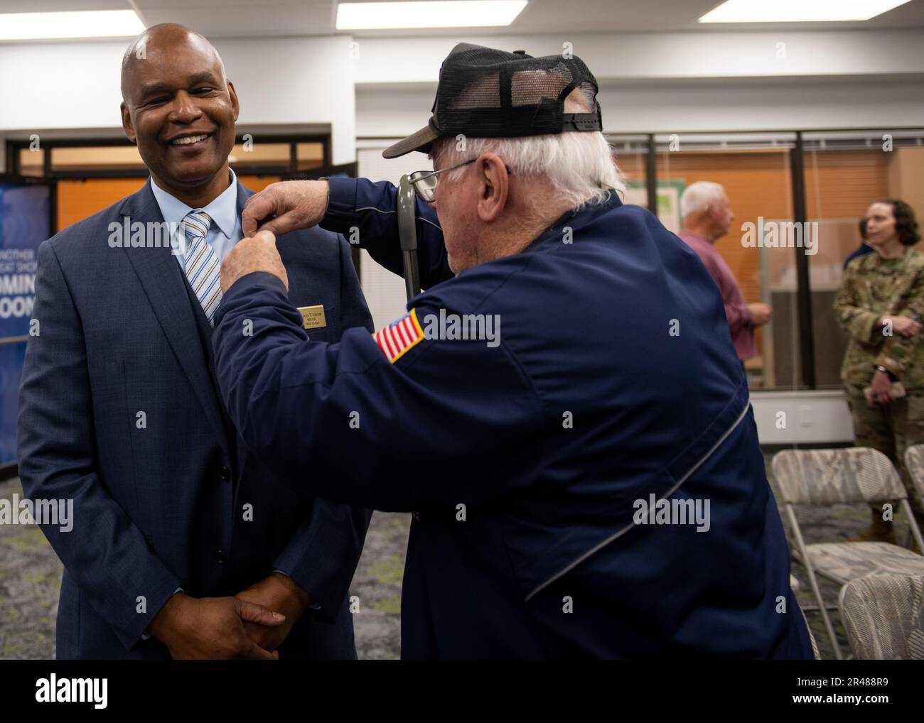 Louis Vance, 88th Mission Support Group deputy director, receives a pin ...