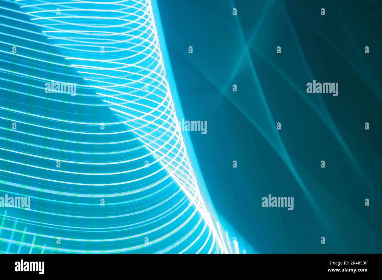 A large display featuring a pattern of blue lights radiating outward ...