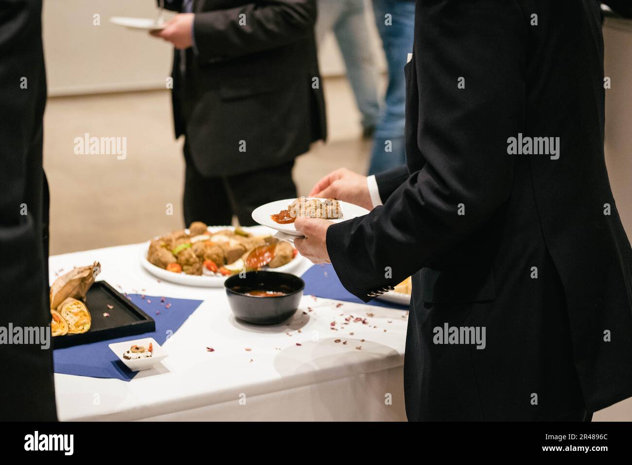 People serving themselves hi-res stock photography and images - Alamy