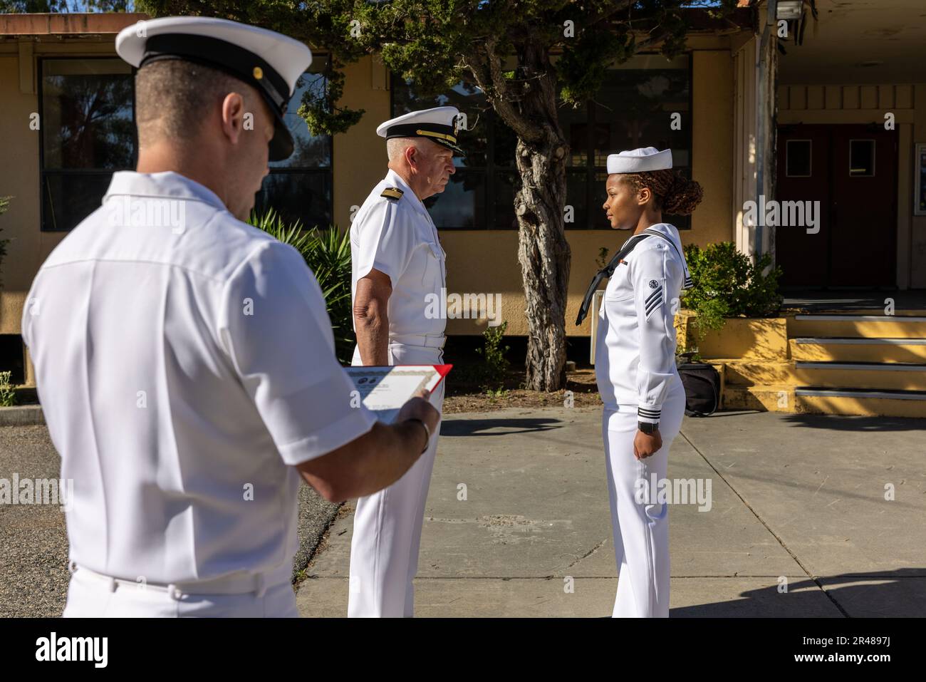 U.S. Navy Senior Chief Petty Officer Joseph Stroney, left, the Navy ...