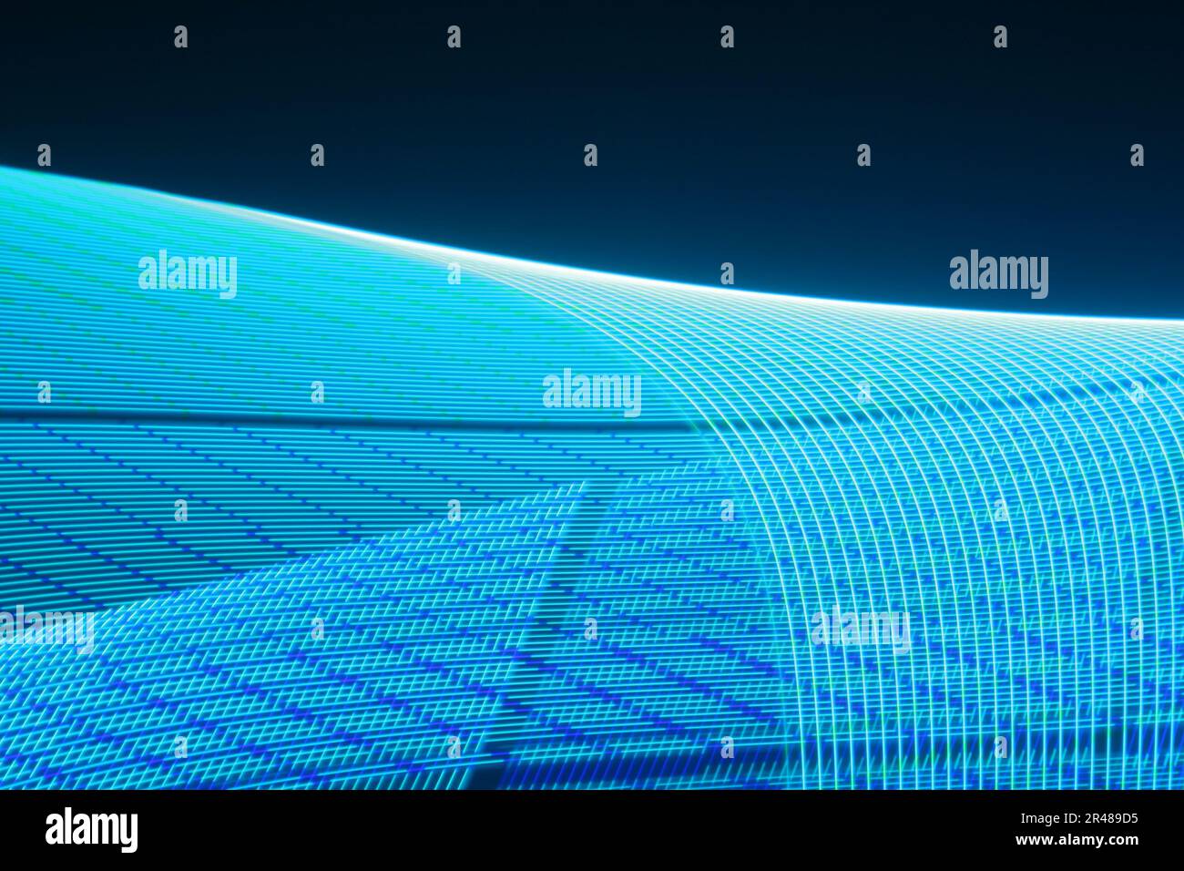 A large display featuring a pattern of blue lights radiating outward ...