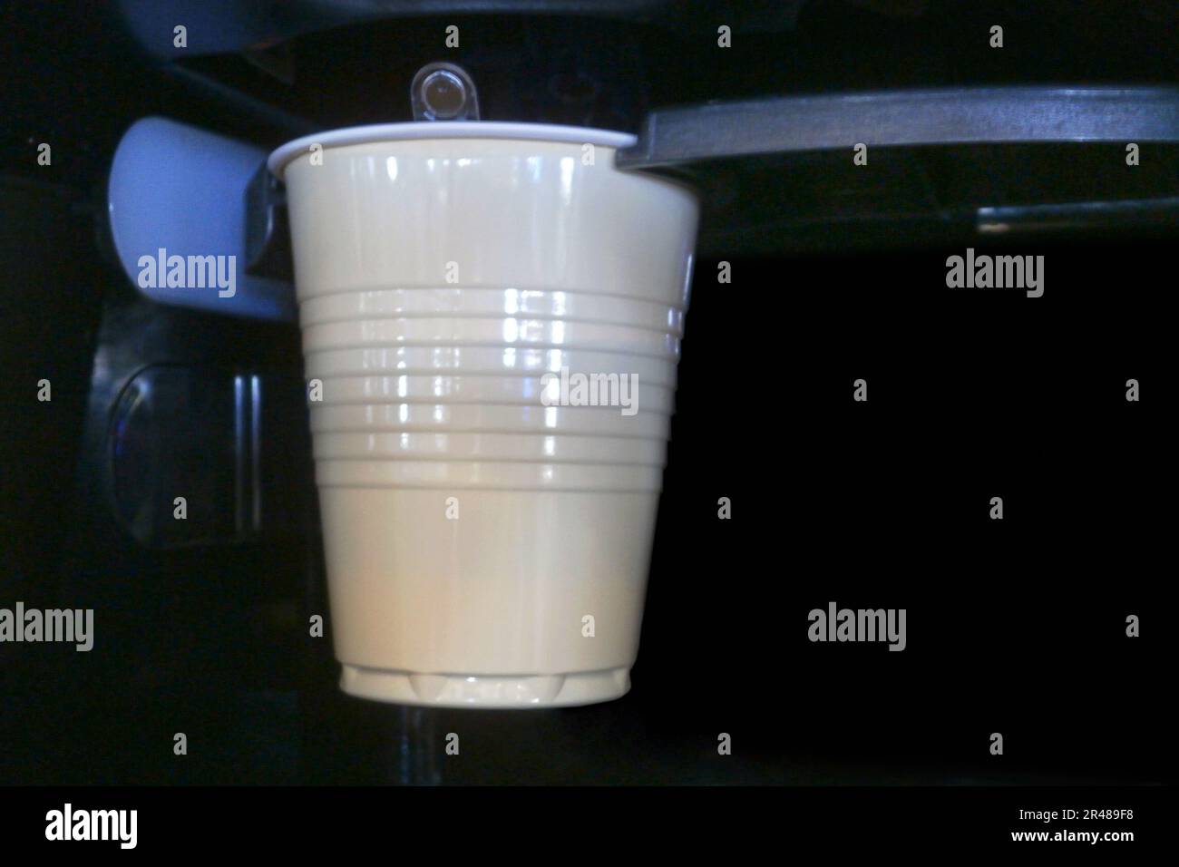 Close up on a disposable cup inside a coffee vending machine Stock ...