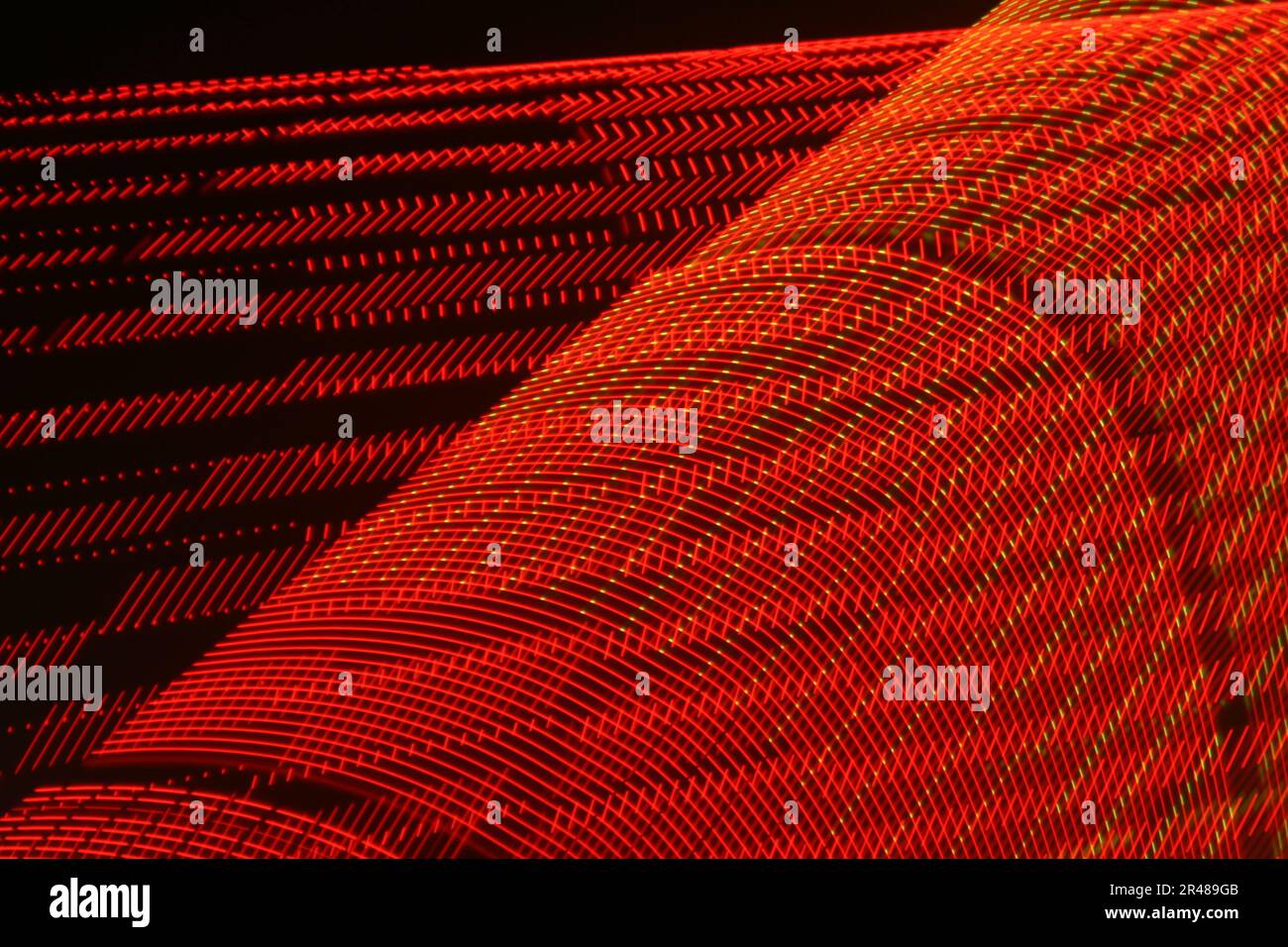 A large display featuring a pattern of red lights radiating outward ...