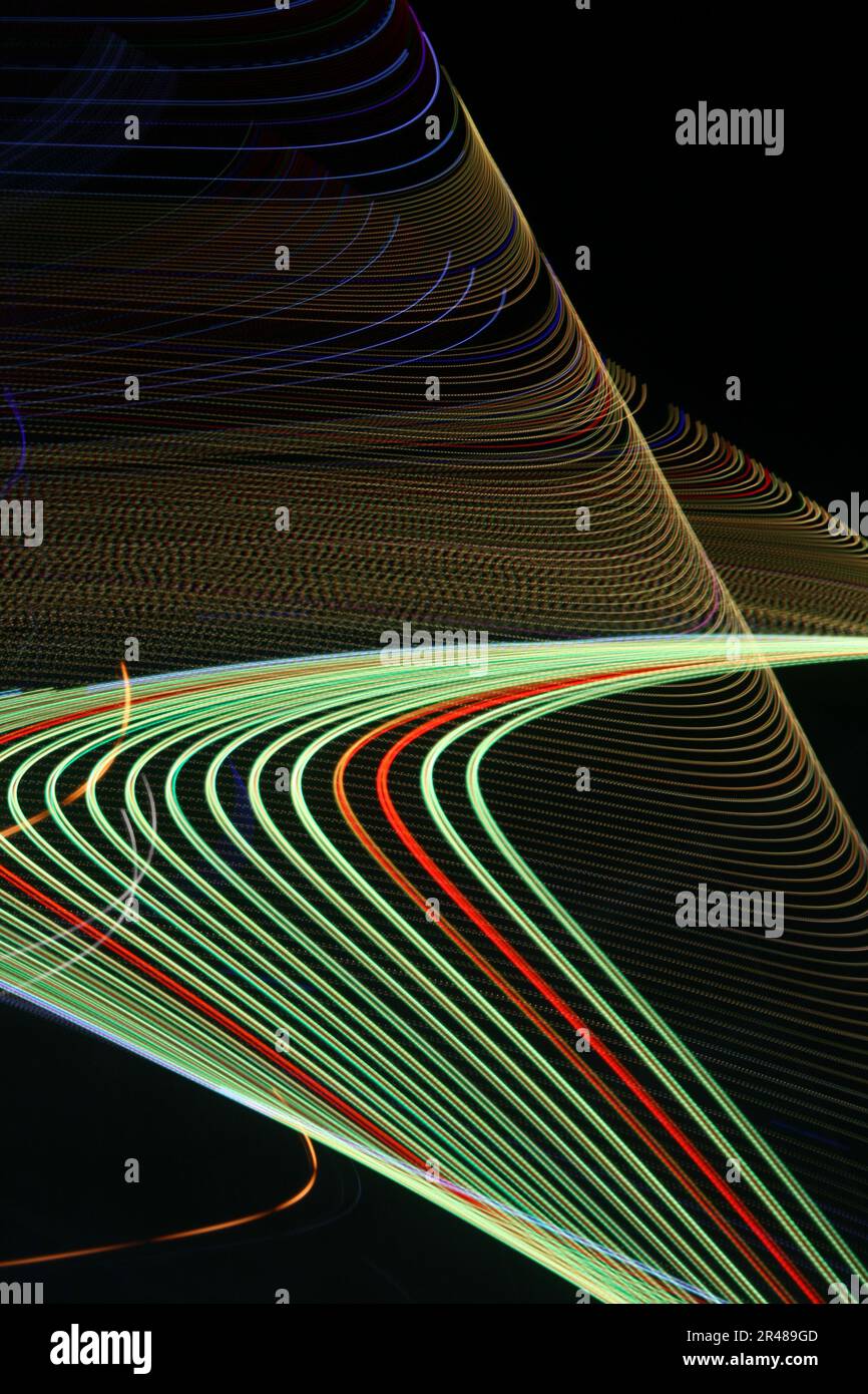 A large display featuring a pattern of red and green lights radiating ...