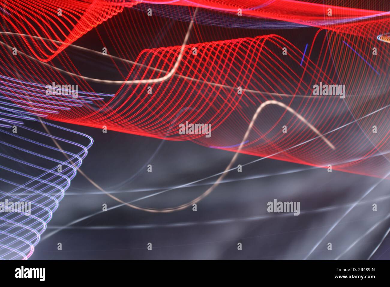 A large display featuring a pattern of red and white lights radiating ...