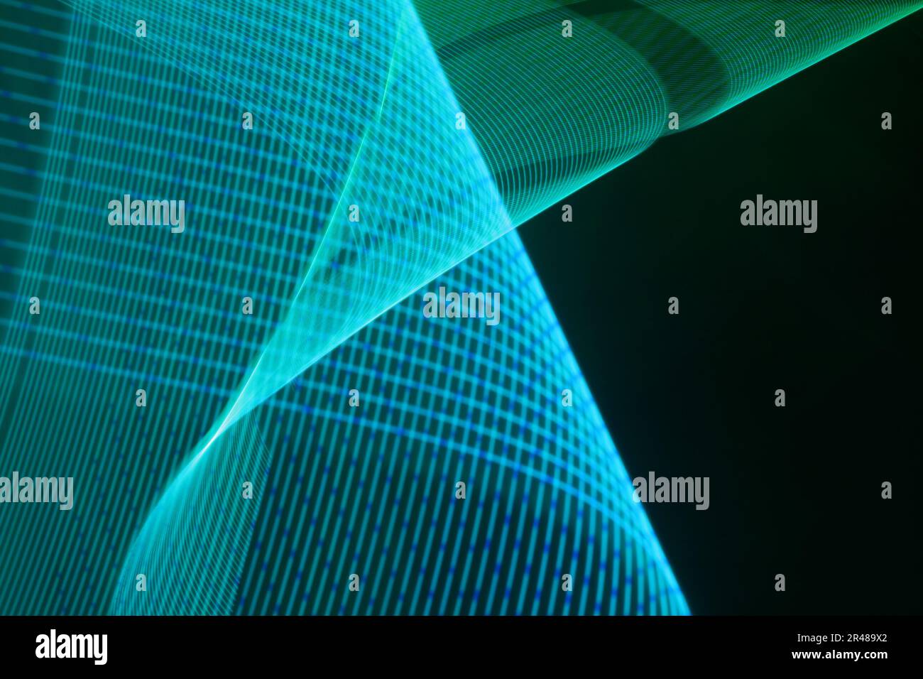 A large display featuring a pattern of blue lights radiating outward ...
