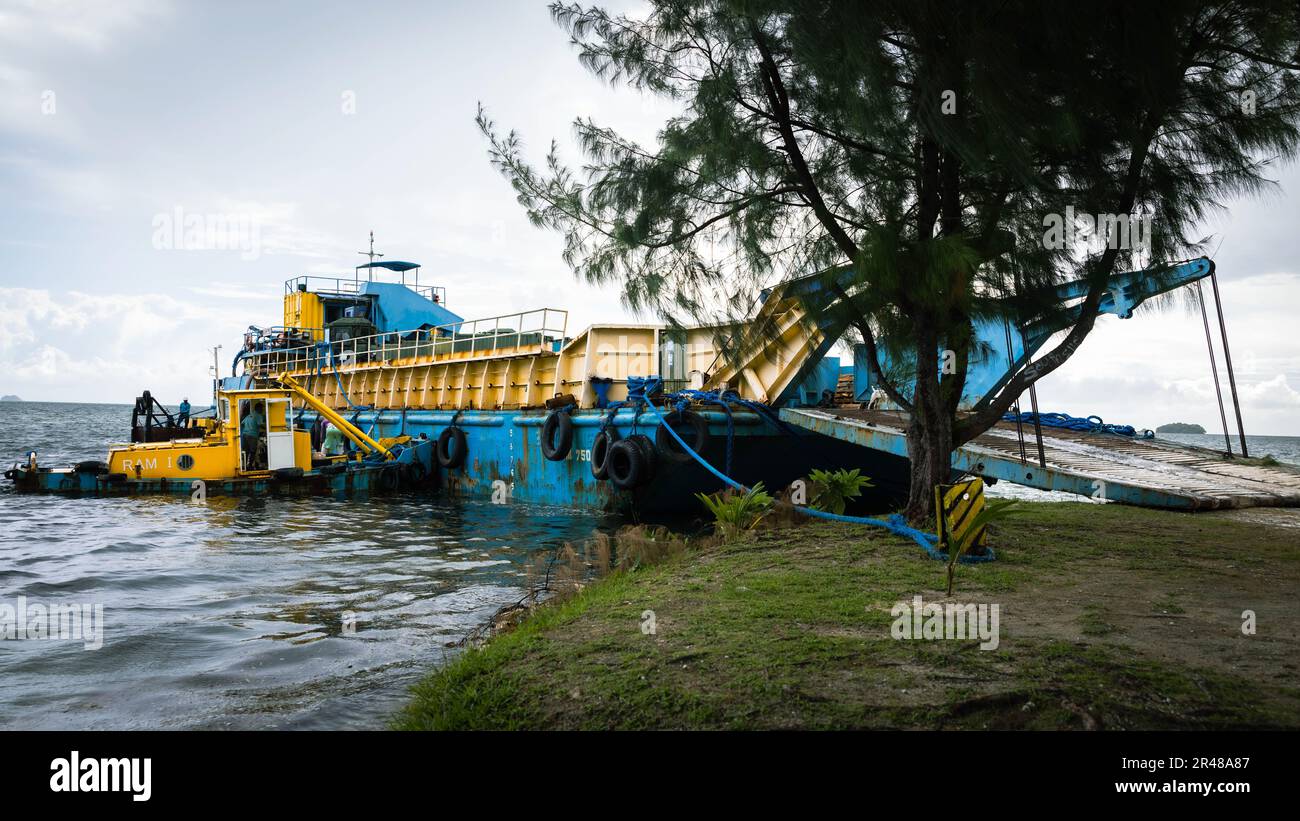 Joanne B Ram 750 barge pulls into shore with equipment shipped from ...