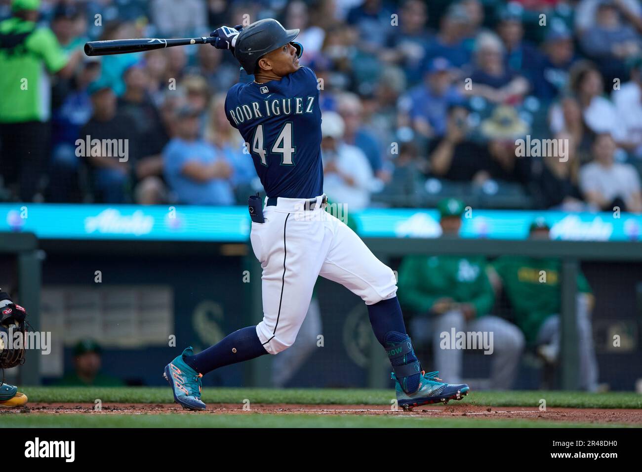 Seattle Mariners' Julio Rodriguez swings through hitting a single ...
