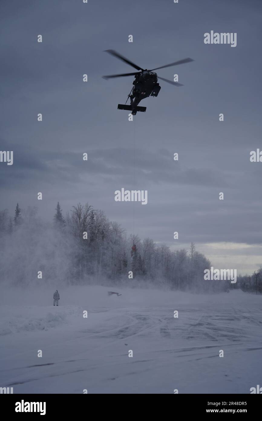 Alaska Army Guard Spc. Matthew Tucker, a flight medic assigned to Golf ...
