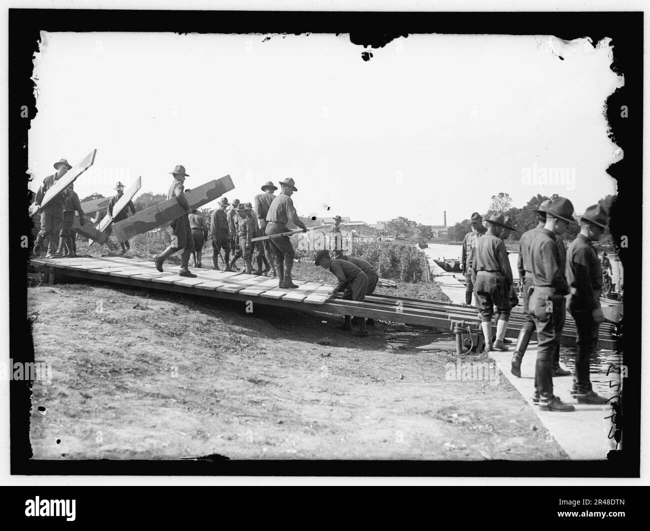 US Army Engineering unit building a pontoon bridge at Washington ...