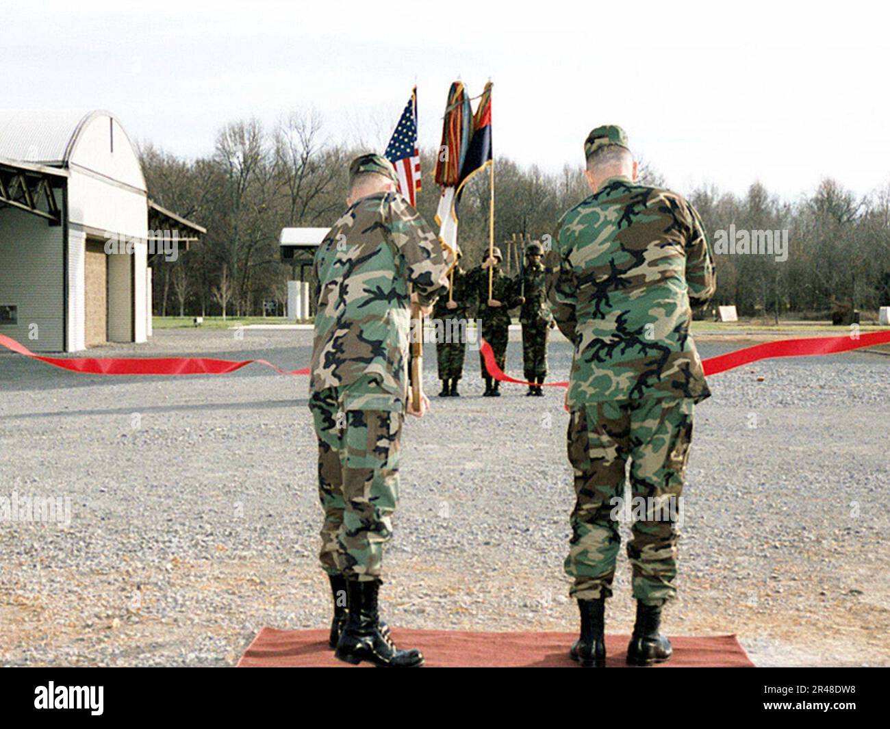 US Army General Jack Keane and Major General Robert Clark cut the ...