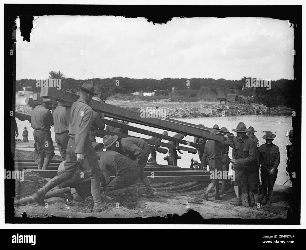 US Army Engineering unit building a pontoon bridge at Washington ...