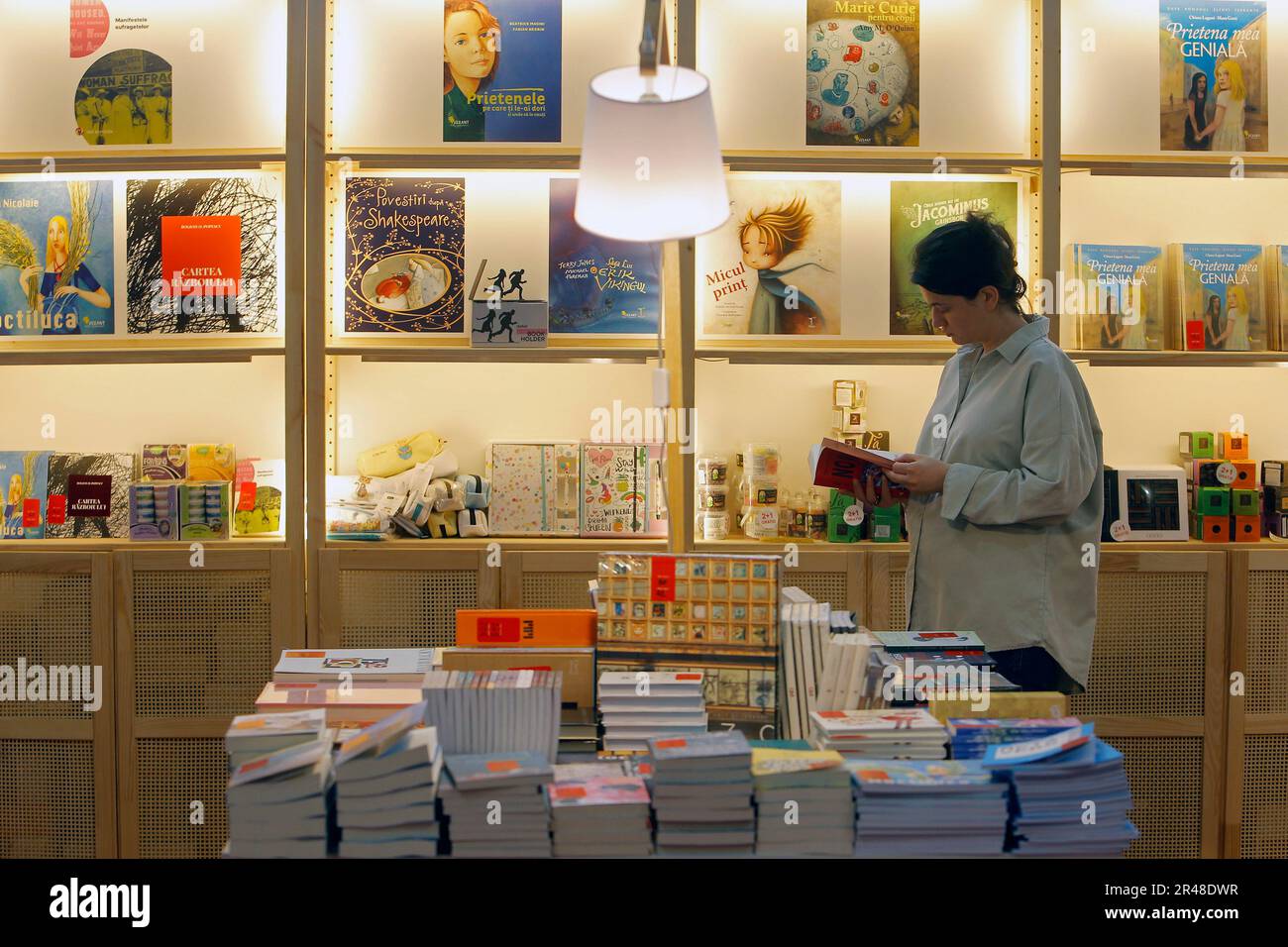 Bucharest, Romania. 26th May, 2023. A woman reads a book at the Bookfest, an international book ...