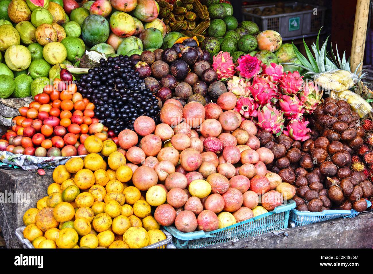 A vibrant selection of tropical fruits from Bali, Indonesia, displayed ...