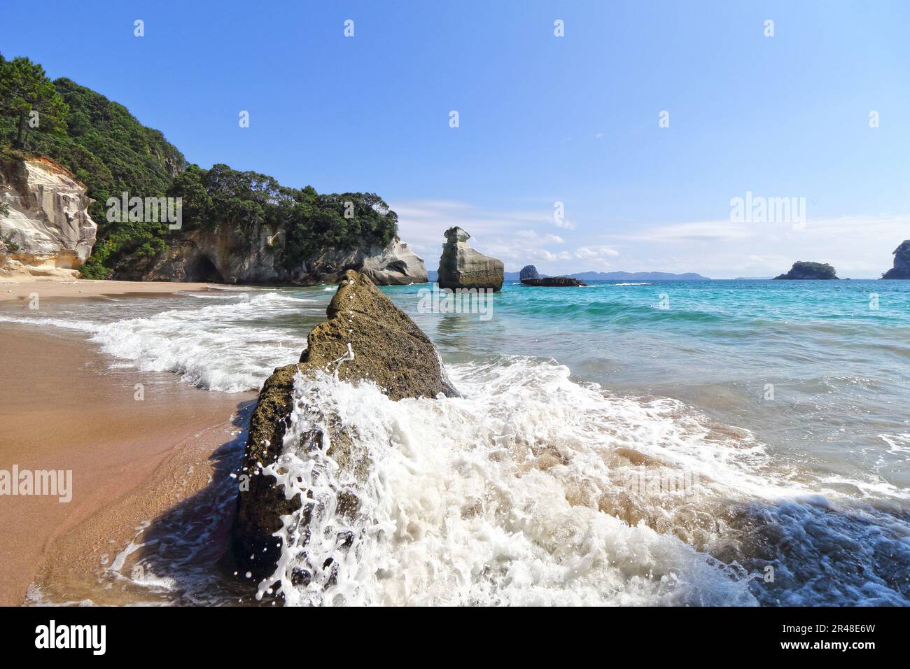 A picturesque view of Cathedral Cove, a popular tourist destination ...