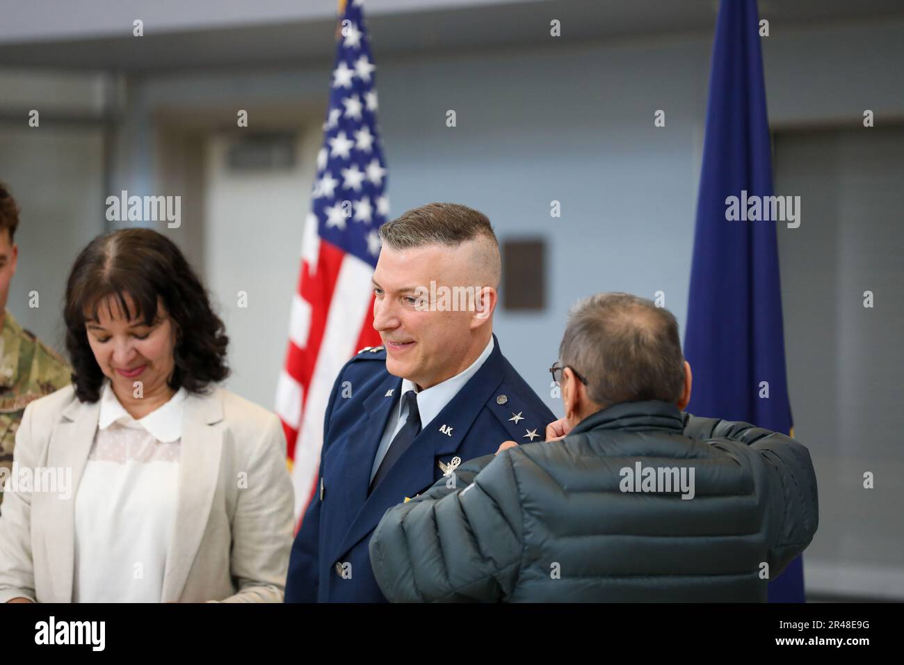 Retired Maj. Robert Hoffman, right, honored guest, pins a third star on ...