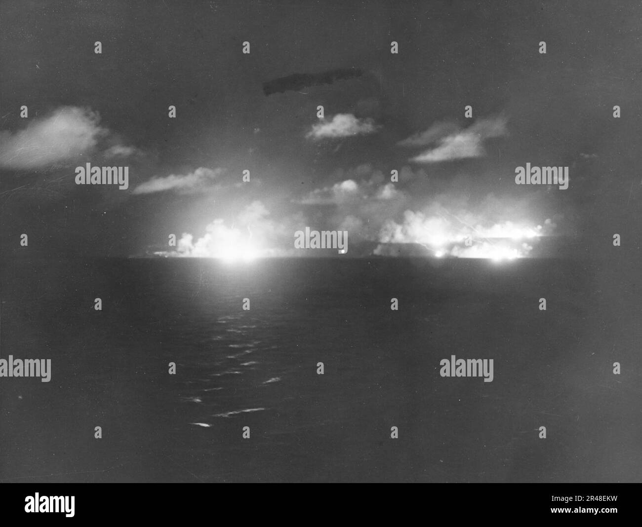 US cruisers firing at Battle of Surigao Strait 1944 Stock Photo - Alamy