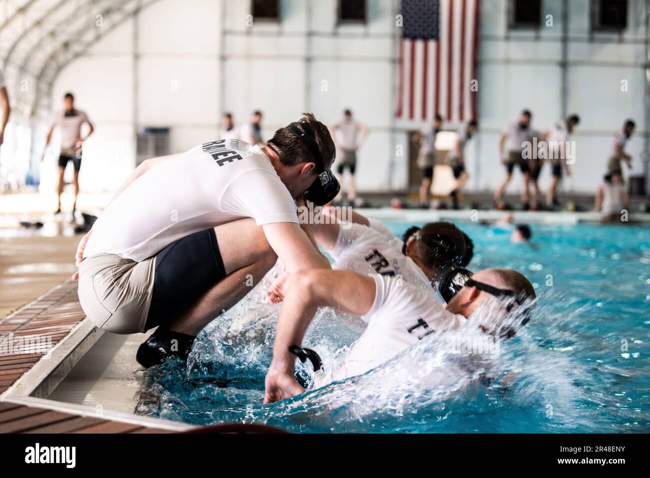 Special Warfare candidates complete team challenges in the pool while ...