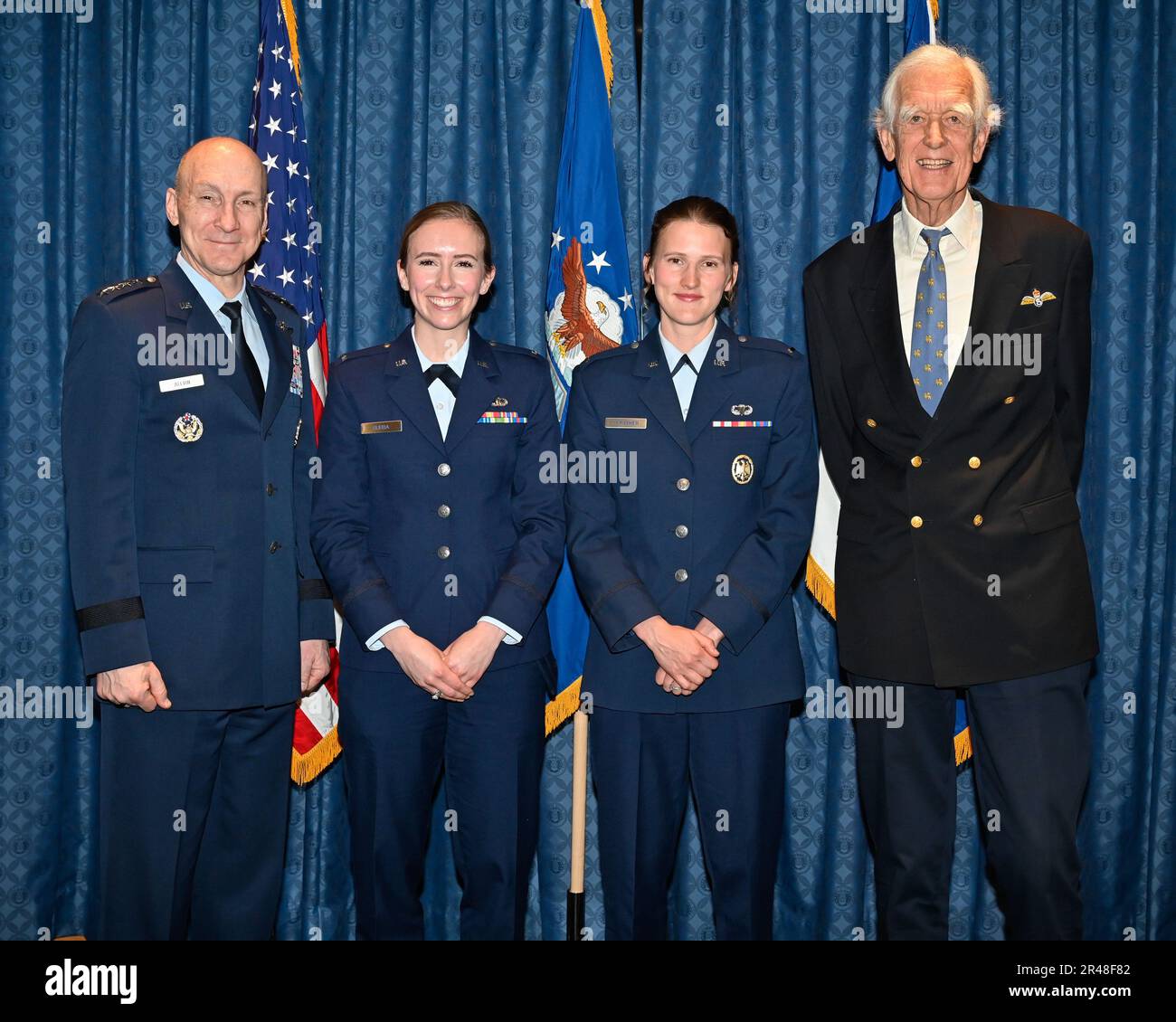 Air Force Vice Chief of Staff Gen. David W. Allvin, left, poses with ...