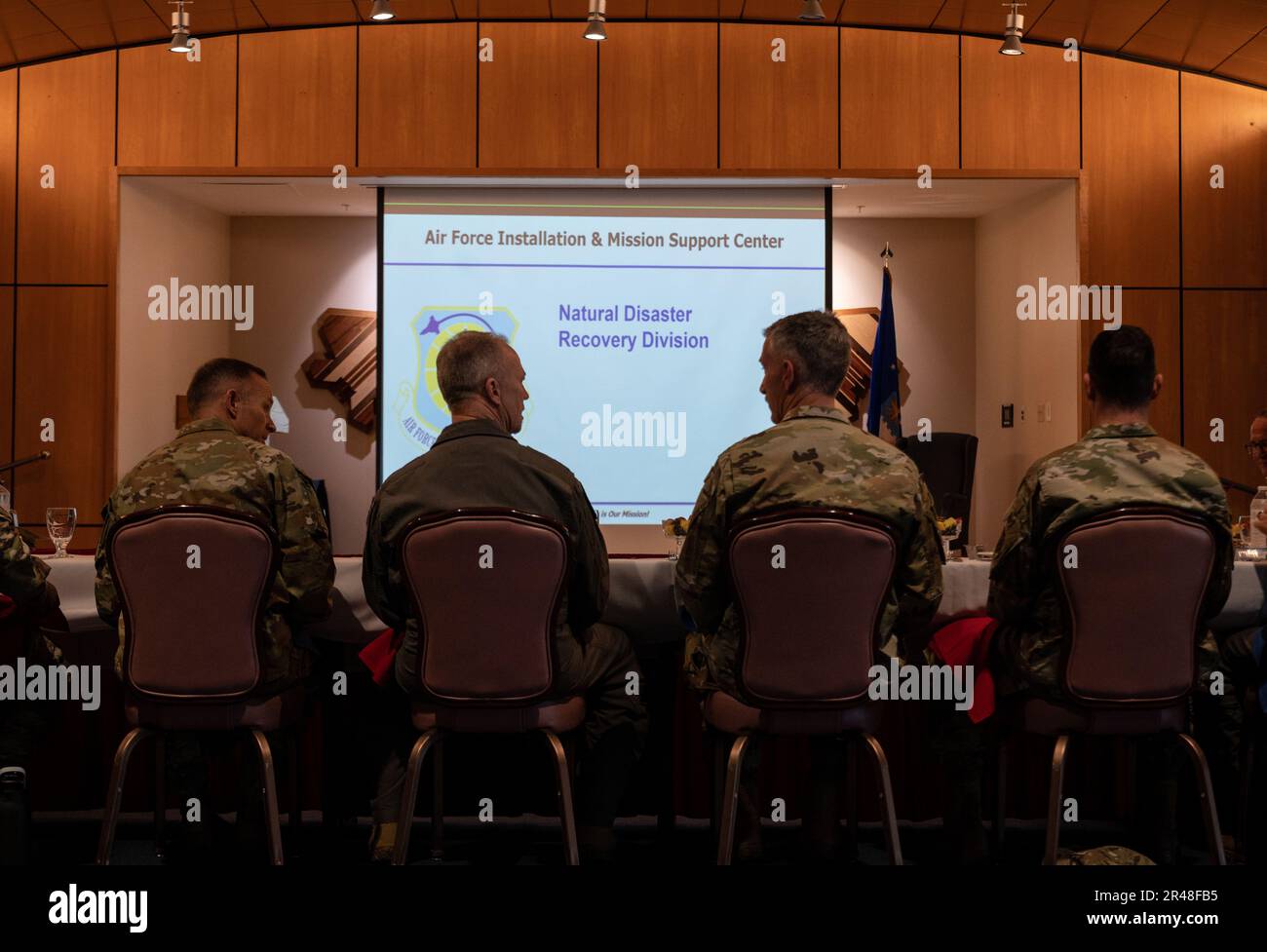 U.S. Air Force Gen. Mark Kelly, commander of Air Combat Command, center ...