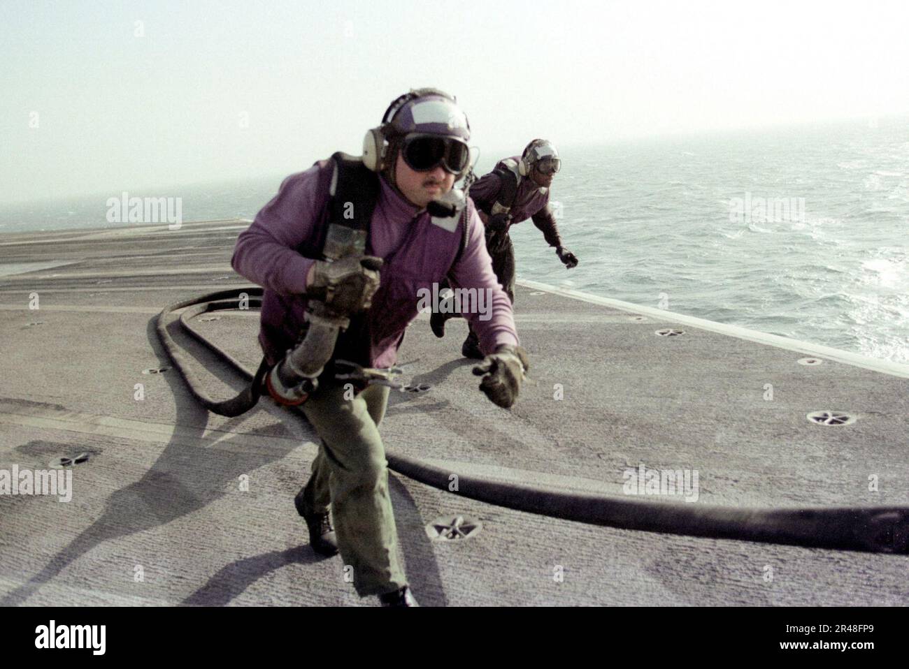 US Navy Aircraft refueling operations aboard ship Stock Photo - Alamy