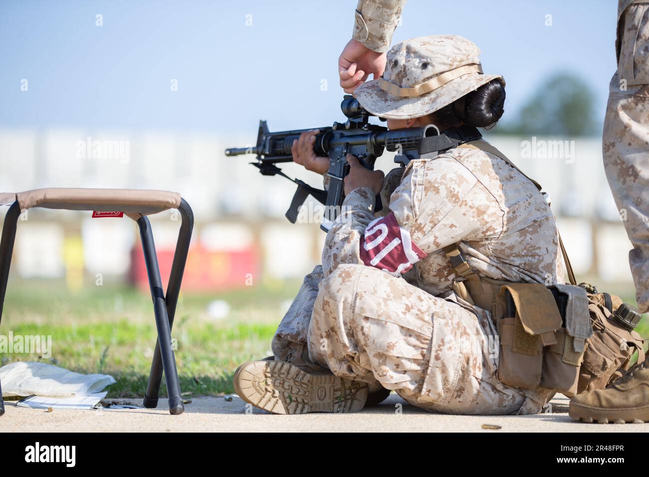 A recruit with Oscar Company, 4th Recruit Training Battalion, receives ...