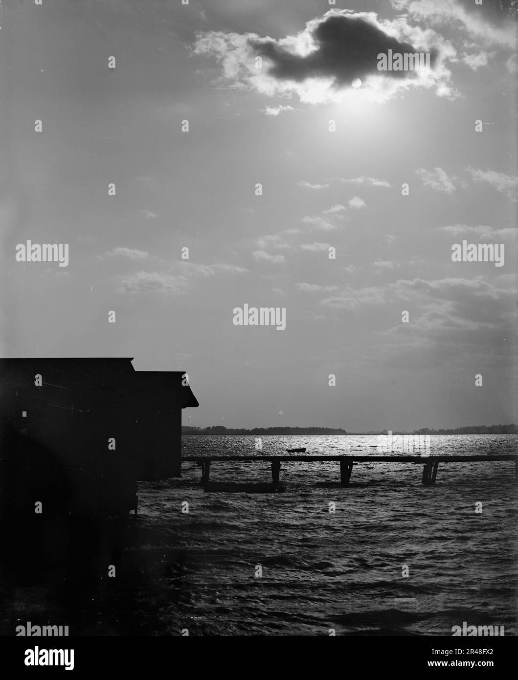 Sunset in sea from Black and White Stock Photos & Images - Alamy