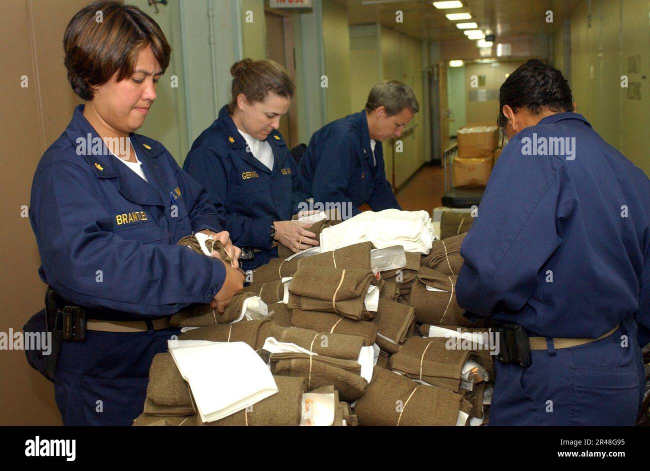 US Navy Sailors aboard USNS Comfort (T-AH 20) assemble personal care ...