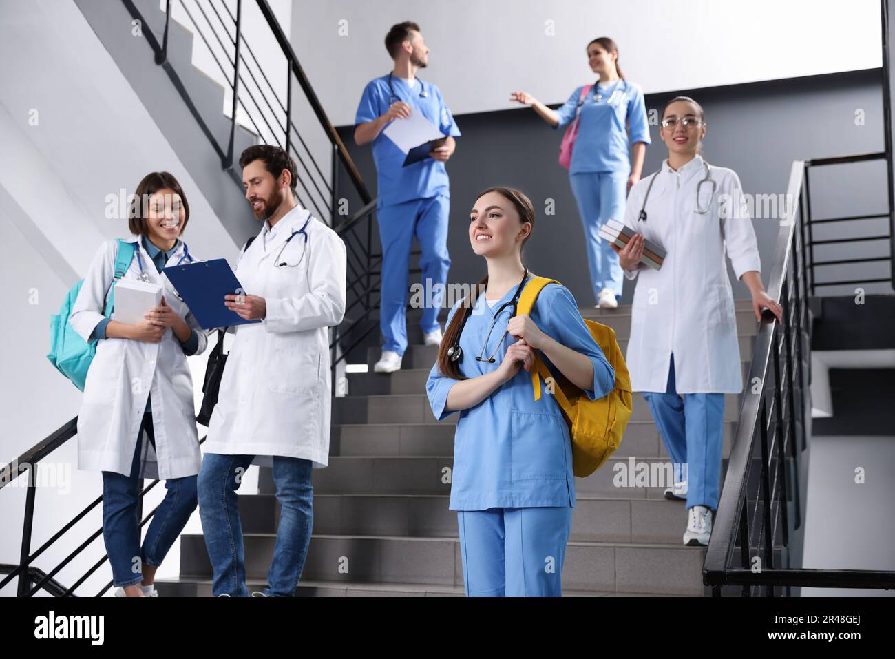Medical students wearing uniforms on staircase in college Stock Photo ...