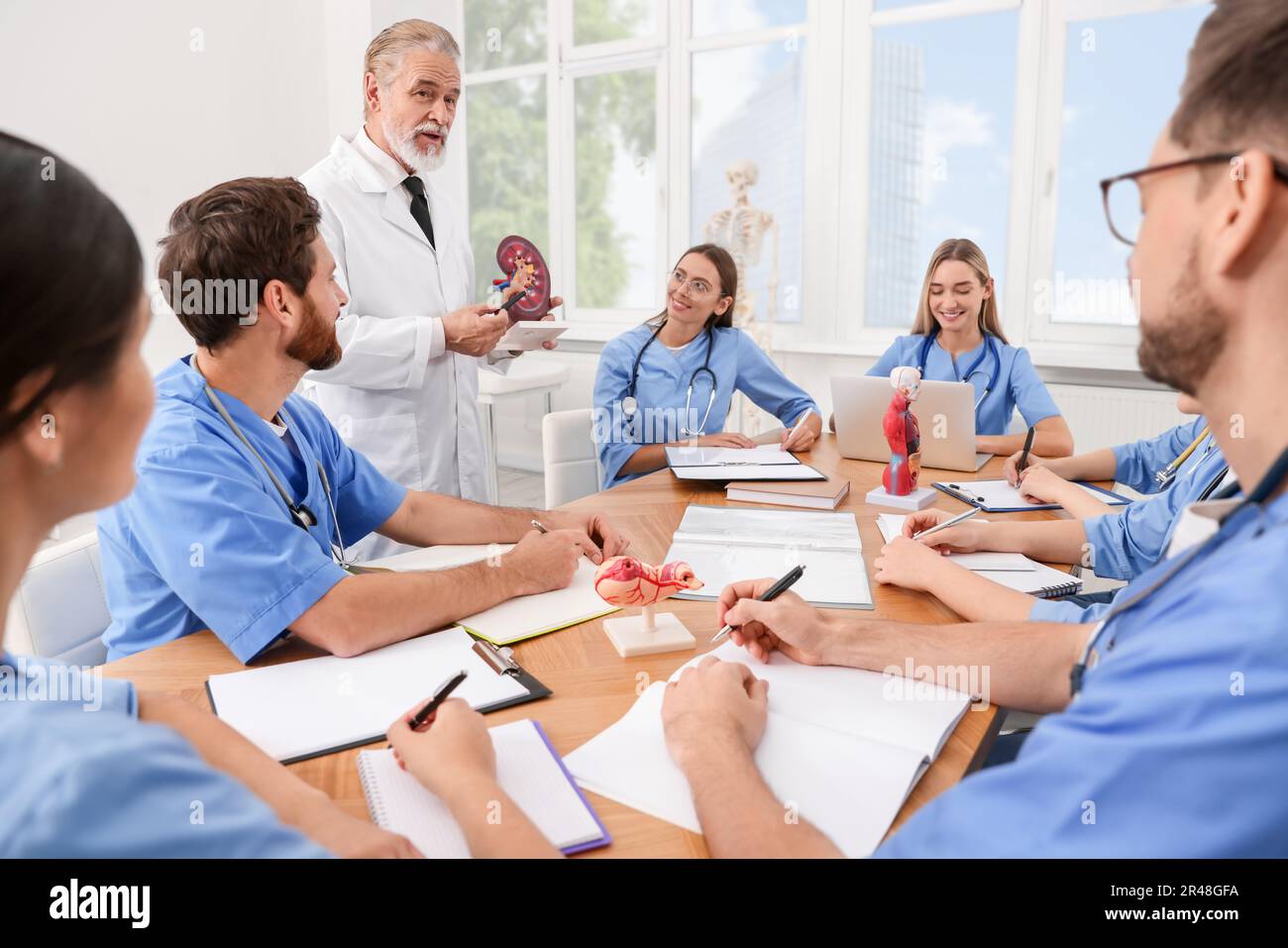 Doctor giving lecture for interns in university Stock Photo - Alamy