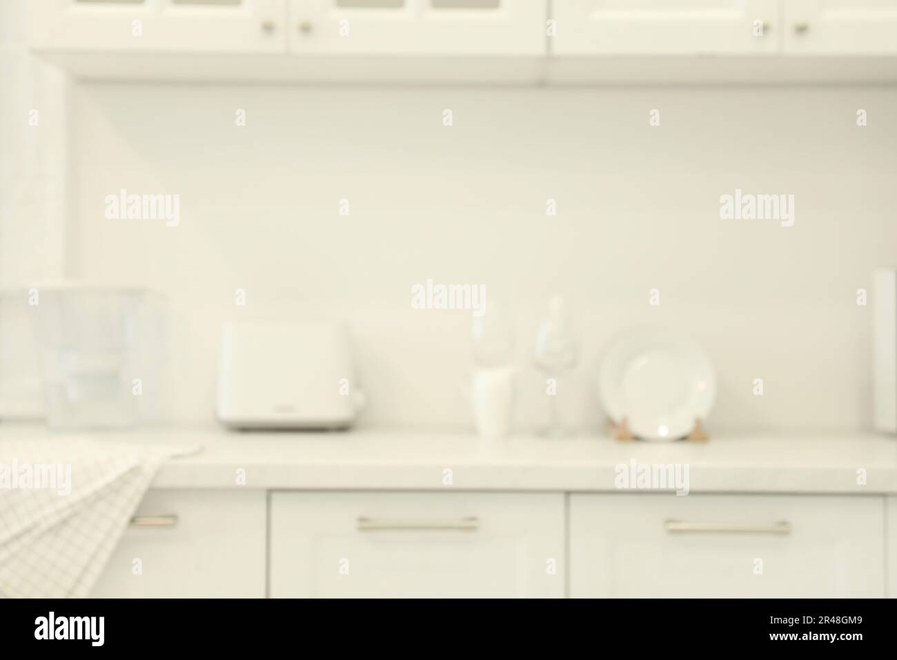 Blurred view of modern kitchen. Interior design Stock Photo - Alamy