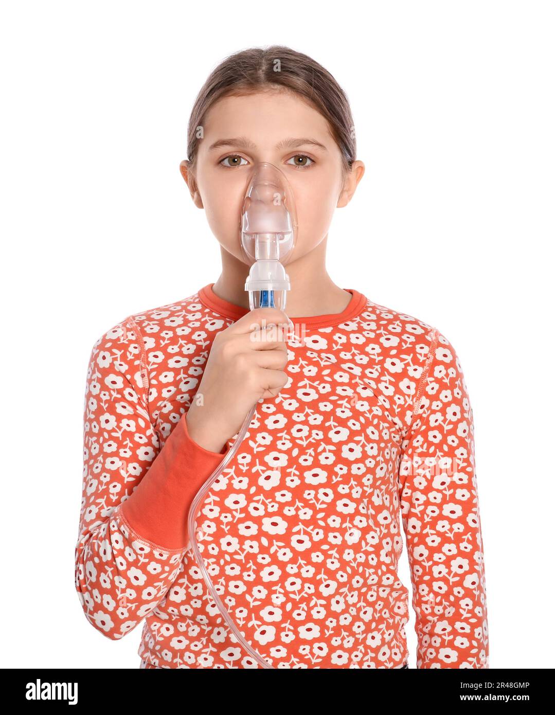 Cute girl using nebulizer for inhalation on white background Stock ...