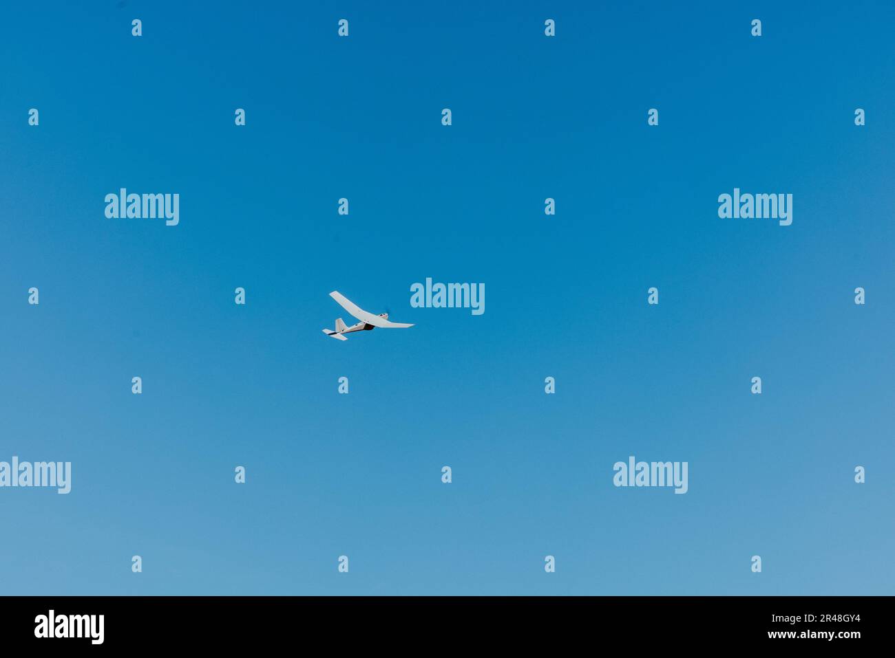 A RQ-20B Puma aircraft flies over a simulated enemy during a maritime ...