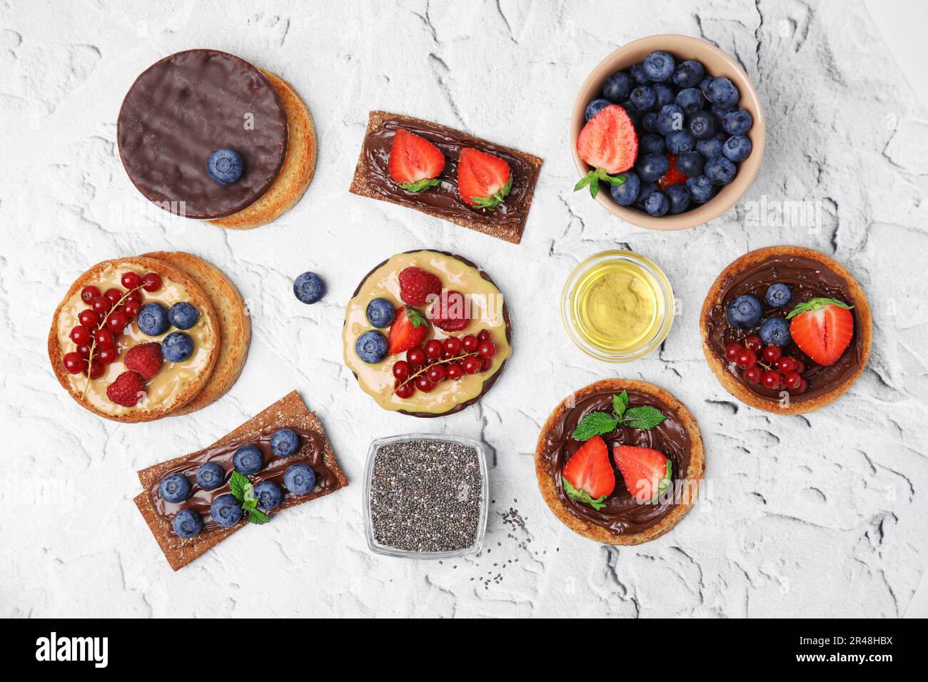 Fresh rye crispbreads, crunchy rice cakes and rusks with different ...