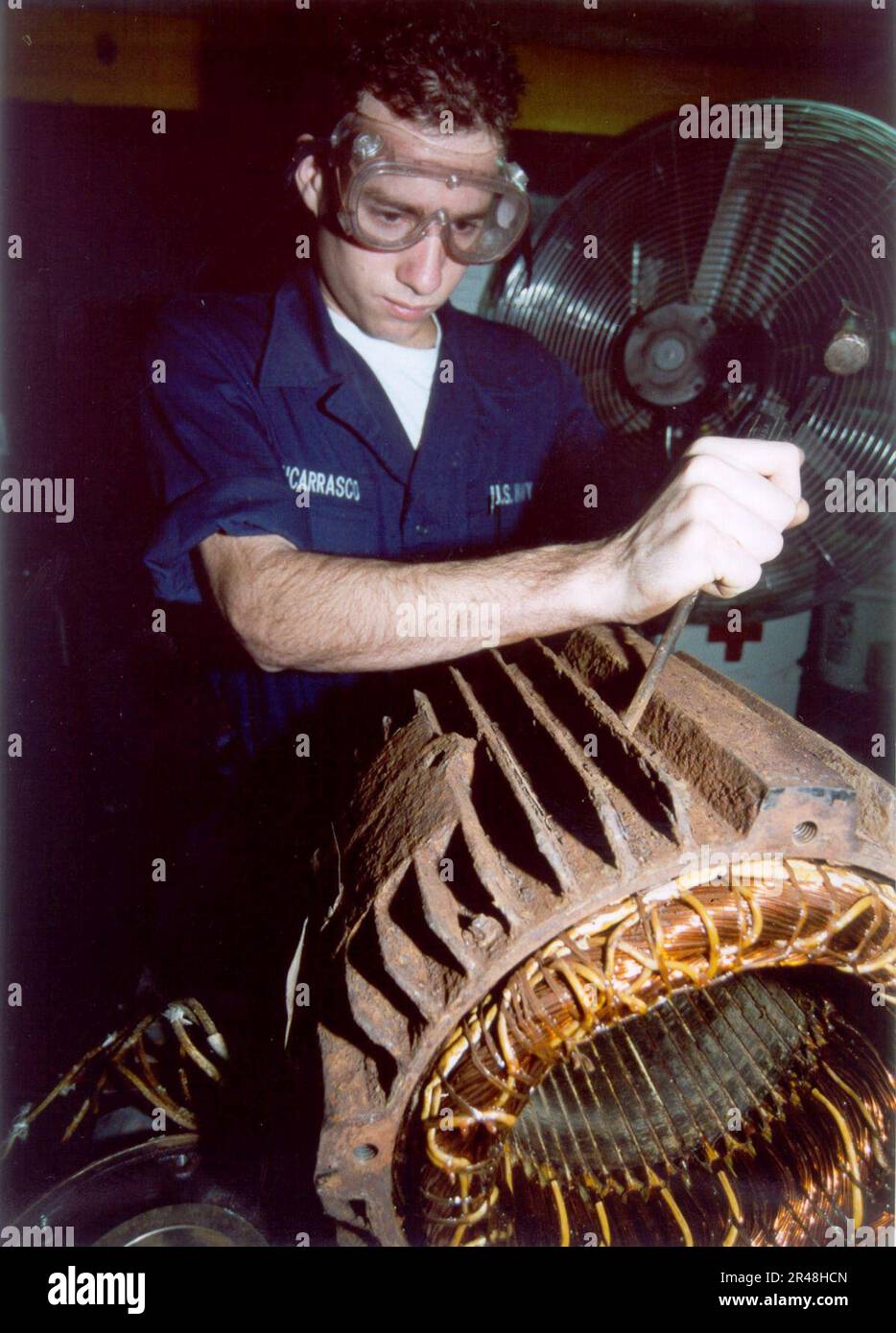 US Navy Small motor maintenance aboard ship Stock Photo - Alamy